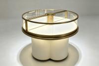 China Custom Luxury 2-Compartment Jewelry Island Showcase with Lockable Circular Glass and Brushed Gold Metal Frame for sale