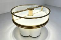 China Custom Luxury 2-Compartment Jewelry Island Showcase with Lockable Circular Glass and Brushed Gold Metal Frame for sale