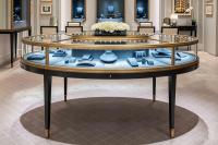 China High-End Oval Jewelry Island Showcase with Curved Tempered-Glass and LED Accent Lighting Featuring Lockable Drawer for sale