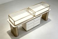 China Luxury Dual Glass Jewelry Showcase Counter with Champagne Gold Metal Frame and LED Illumination for sale