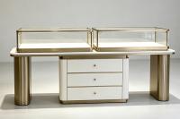 China Luxury Dual Glass Jewelry Showcase Counter with Champagne Gold Metal Frame and LED Illumination for sale