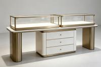 China Luxury Dual Glass Jewelry Showcase Counter with Champagne Gold Metal Frame and LED Illumination for sale