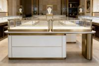 China Modern Jewelry Counter with Brushed Champagne Gold Frame, Offset Dual Glass Showcase, and Lockable Storage Drawers for sale
