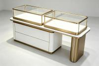 China Modern Jewelry Counter with Brushed Champagne Gold Frame, Offset Dual Glass Showcase, and Lockable Storage Drawers for sale