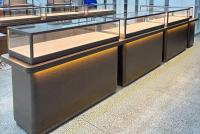 China Modular Dark Wood Grain Jewelry Showcase Counter with Curved Cabinet and Bottom Ambient Light for sale
