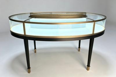 China Luxury Round Jewelry Island Counter with Full-Circle Bent Tempered-Glass and Brushed Gold Metal Frame Featuring Built-In LED Lighting for sale