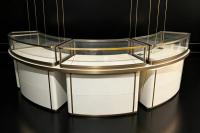 China Modular Combined Jewelry Showcase with Brushed Gold Frame and Hidden LED Lighting Display Counter for sale