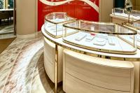 China Luxury Symmetrical C-Shape Jewelry Island Counter with Built-in LED Lighting and Lockable Glass Compartments for sale