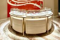 China Luxury Symmetrical C-Shape Jewelry Island Counter with Built-in LED Lighting and Lockable Glass Compartments for sale