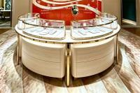 China Luxury Symmetrical C-Shape Jewelry Island Counter with Built-in LED Lighting and Lockable Glass Compartments for sale