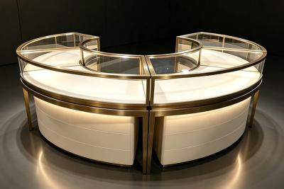 China C-Shaped Curved Jewelry Island Showcase with Brushed Gold Frame and Leather-Wrapped Base Display Counter for sale