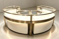 China C-Shaped Curved Jewelry Island Showcase with Brushed Gold Frame and Leather-Wrapped Base Display Counter for sale