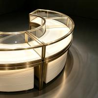 China Modular U-Shaped Jewelry Island Showcase with Brushed Champagne Gold Frame Display Counter for sale
