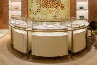China Brushed Bronze Metal Frame Modular Jewelry Island Showcase with Built-in LED Lighting for sale