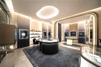 China Modern Light-Luxury Jewelry Showroom with Curved Showcase and Full-Store Custom Fit-Out for sale