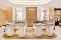China Luxury Jewelry Showroom with Full-Store Customization Featuring Textured Curved Showcases and Italian-Inspired Aesthetics for sale