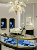 China New-Classical French Style Jewelry Boutique with Full-Store Customization and Oval Gold-Trim Island Showcase for sale