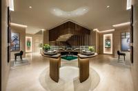 China Modern-Luxury Minimalist Watch Showcase Display with Circular Wood Island and VIP Lounge & Bar Area for sale
