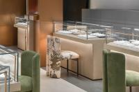 China Modern-Oriental Minimalist Jewelry Showroom with Stone-Veneer Display Cases and Freestanding Pillar Vitrines for sale
