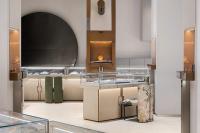 China Modern-Oriental Minimalist Jewelry Showroom with Stone-Veneer Display Cases and Freestanding Pillar Vitrines for sale