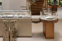 China Modern-Oriental Minimalist Jewelry Showroom with Stone-Veneer Display Cases and Freestanding Pillar Vitrines for sale