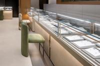 China Modern-Oriental Minimalist Jewelry Showroom with Stone-Veneer Display Cases and Freestanding Pillar Vitrines for sale
