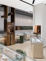 China Modern-Oriental Minimalist Jewelry Showroom with Stone-Veneer Display Cases and Freestanding Pillar Vitrines for sale