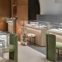 China Modern-Oriental Minimalist Jewelry Showroom with Stone-Veneer Display Cases and Freestanding Pillar Vitrines for sale