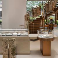 China Modern-Oriental Minimalist Jewelry Showroom with Stone-Veneer Display Cases and Freestanding Pillar Vitrines for sale