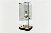 China Museum-Grade Anti-Reflective Glass Display Cabinet With Ultra-Slim Black Metal Frame And Floating Acrylic Display Plinth for sale