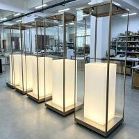 China Anti-Glare Glass Museum Exhibit Cabinet with Tall Solid White Pedestal and Bronze Trim Porcelain Display Tower for sale