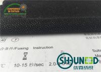 China Broken Twill Weave Fusible Adhesive Black Woven Interlining Material for Men's Suit Heavy Fabric for sale