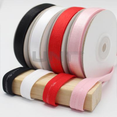 China Good Tearing Strength Pink Silicone Elastic Tape / Unbreakable Rubber Bands For Jumpsuits for sale