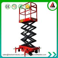 China 300kg Narrow Aisle Scissor Lift 4.8M Portable Hydraulic Lift Table for sale