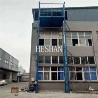 China Heavy Duty 4 Post Steel Cargo Lift Elevator Platform Hydraulic For Warehouse for sale