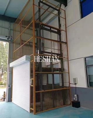 China 3000kg Wall Mounted Cargo Lift Warehouse Heavy Goods Lift Elevator for sale