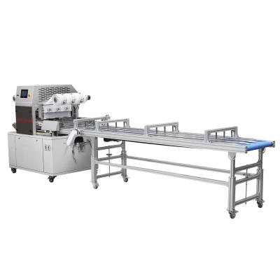 China 4KW Continuous Automatic Vacuum Food Tray Sealer Machine In MAP Plastic Tray packing Equipment for sale