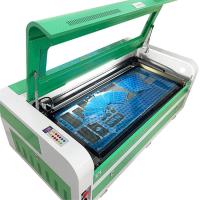 China DAQIN 40x100cm CO2 Laser Tube Engraving And Cutting Machine High Accuracy for sale