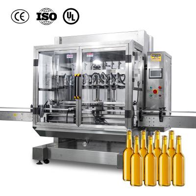 China Stainless Steel Gravity Filling Machine 50-1000ml Custom Volumetric Bottle Filler High Precision ±1% for sale