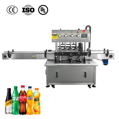 China Fully Enclosed Automatic Spindle Capping Machine 60 BPM - 150 BPM Bottle Capping Machine for sale