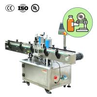China Fully Enclosed Round Bottle Labeler 304 Stainless Steel Cans Labeling Machine for sale