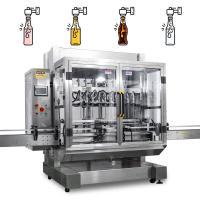 China Automatic Inline Gravity Filling Machine with Time-controlled Gravity Volumetric Filling, Food-grade 304 Stainless Steel, and ≤±0.2% FS Filling Accuracy for sale