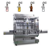 China Automatic Inline Gravity Filling Machine with Time-controlled Gravity Volumetric Filling, Food-grade 304 Stainless Steel, and ≤±0.2% FS Filling Accuracy for sale