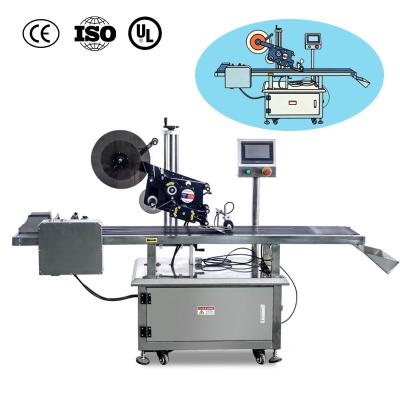 China Automatic Paging Labeling Machine with Friction Feeder for Flat Products at 100 CPM and ±1mm Labeling Accuracy, 220V 50Hz for sale