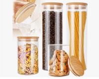 China Novolink High Borosilicate Glass Storage Jar Bottles With Bamboo Lids for sale