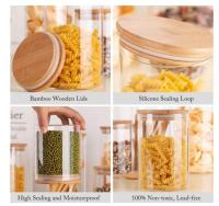 China Novolink High Borosilicate Glass Storage Jar Bottles With Bamboo Lids for sale