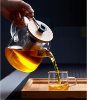 China Novolink OEM 1000ML 1600ML High Borosilicate Glass Teapot with SS Infuser & Bamboo Lid for sale