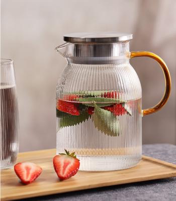 China Novolink High Borosilicate Glass Teapot Clear Pitcher With Yellow Handle for Hot and Cold Drinks 1200ml for sale
