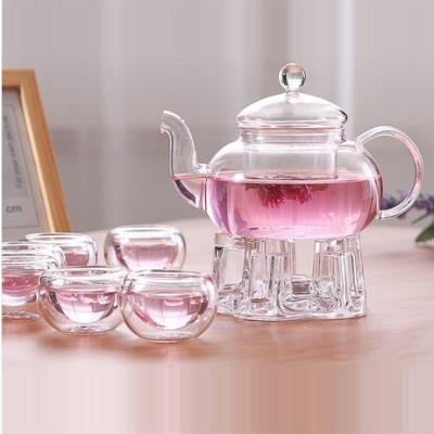 China Novolink OEM 8 Set High Borosilicate Glass Teapot 600ml With Tea Light Heating Stand for sale