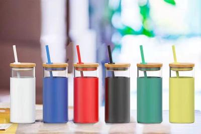 China Transparent Beverages High Borosilicate Glass Cup With Bamboo Lid for sale